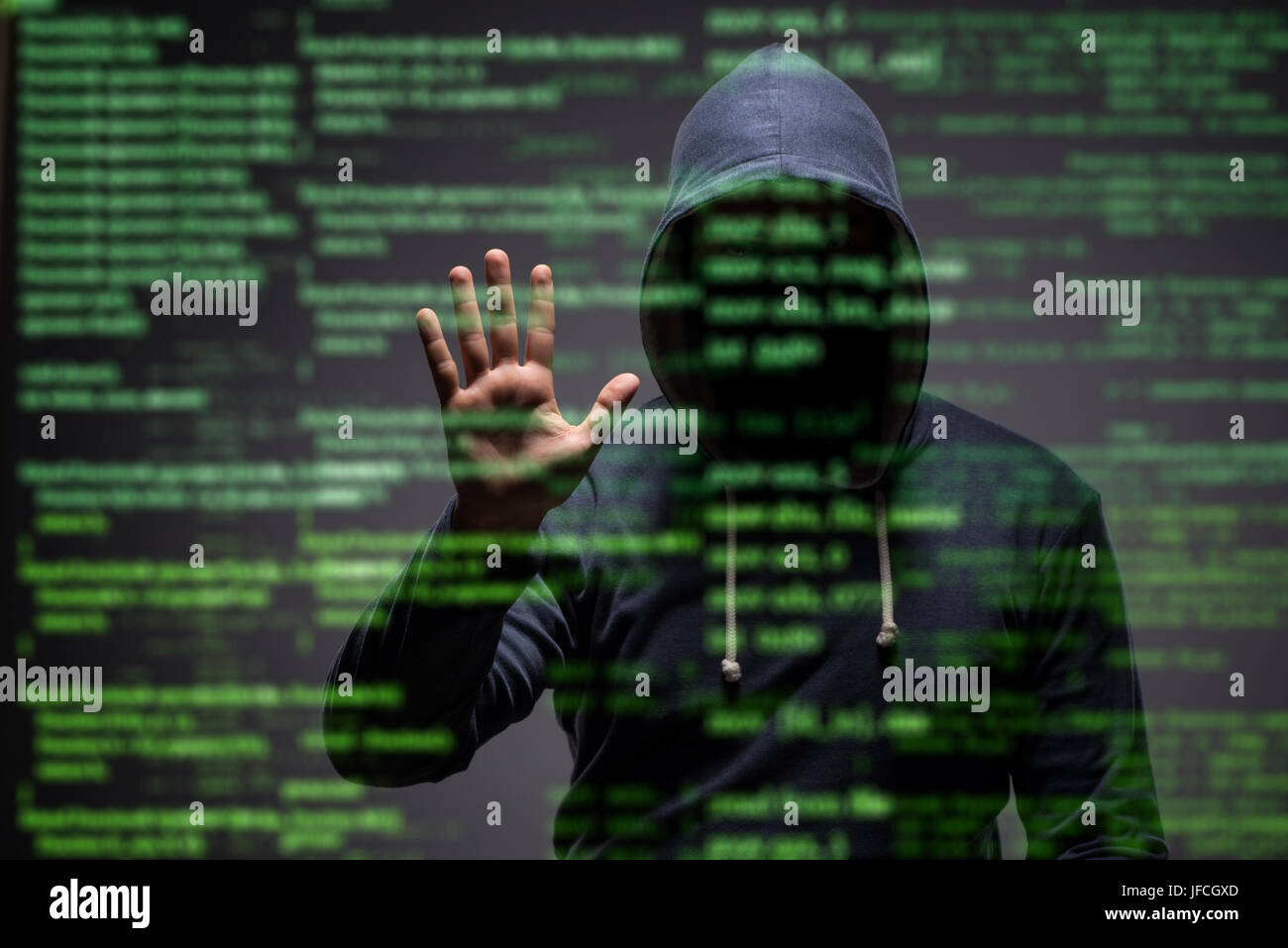 Young hacker in data security concept Stock Photo - Alamy