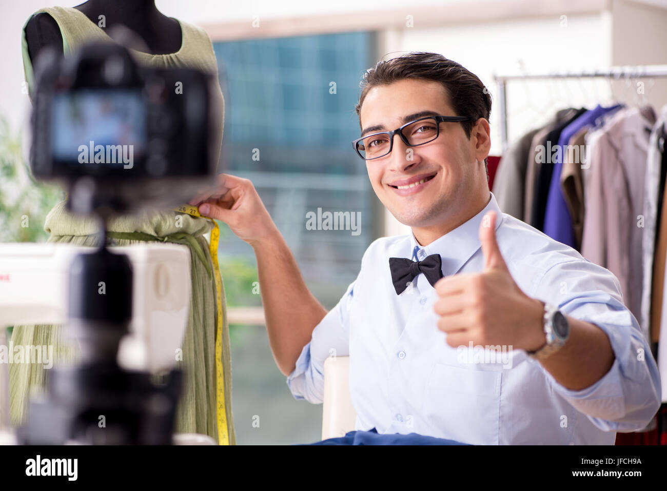 Young man working as fashion video blogger Stock Photo - Alamy