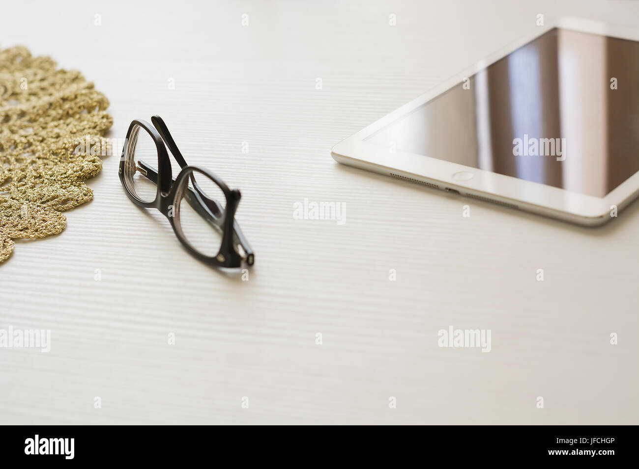 glasses and tablet Stock Photo - Alamy