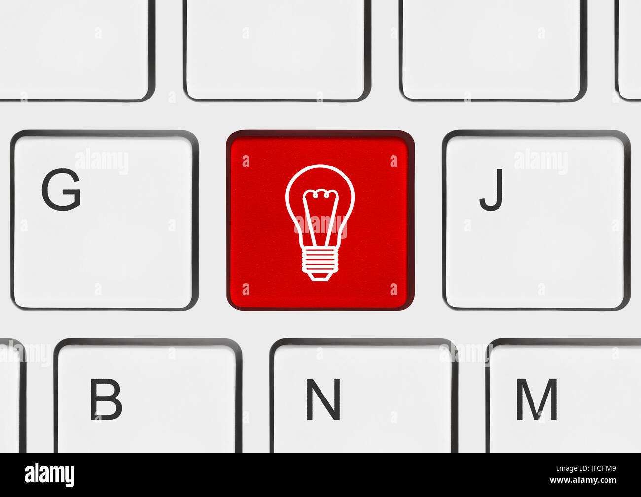 Computer keyboard with lamp key Stock Photo - Alamy