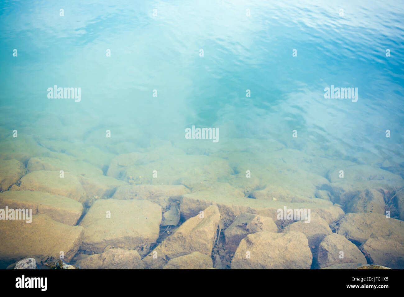 water with rocks Stock Photo - Alamy