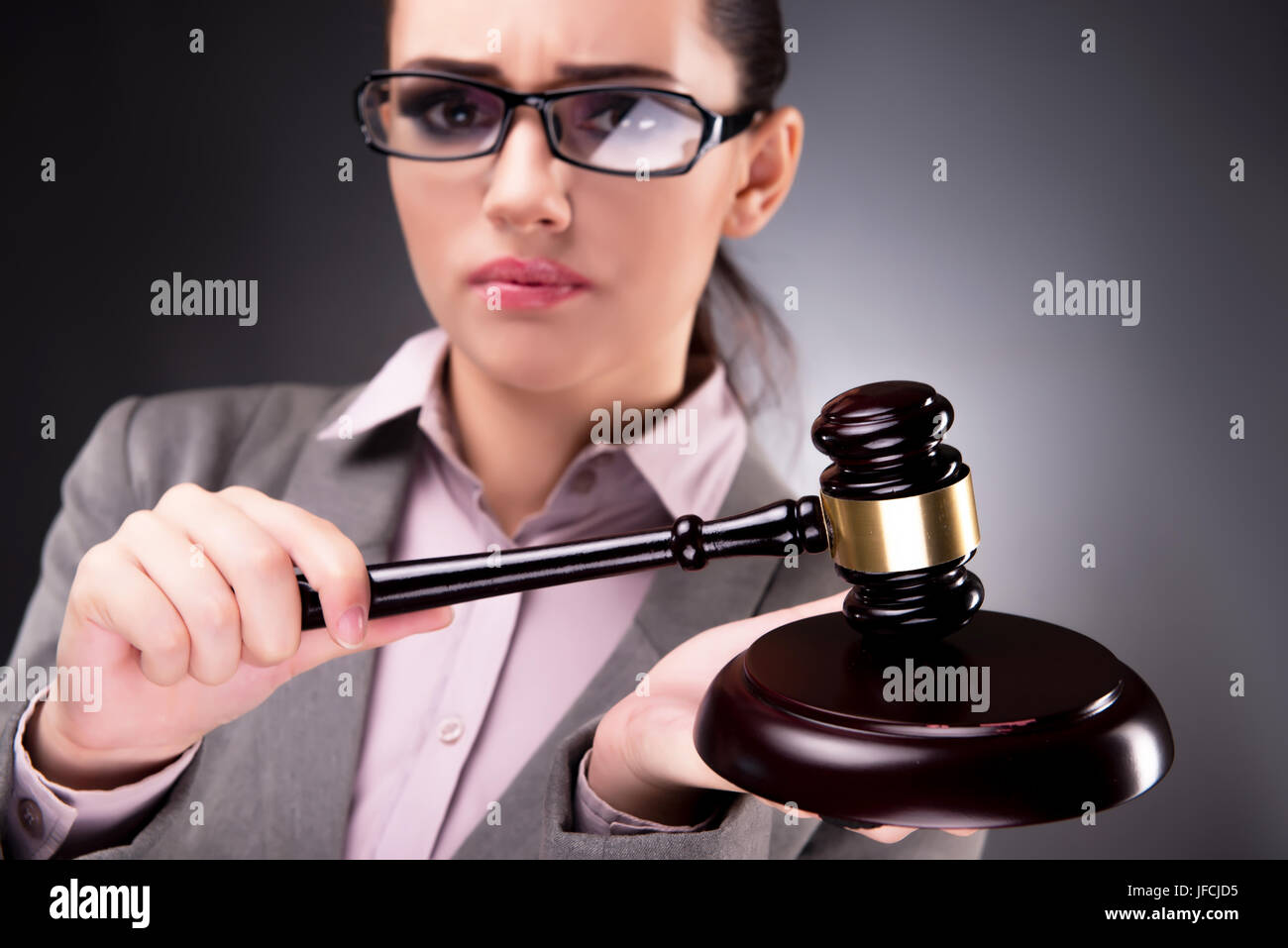 Woman judge with gavel in justice concept Stock Photo - Alamy
