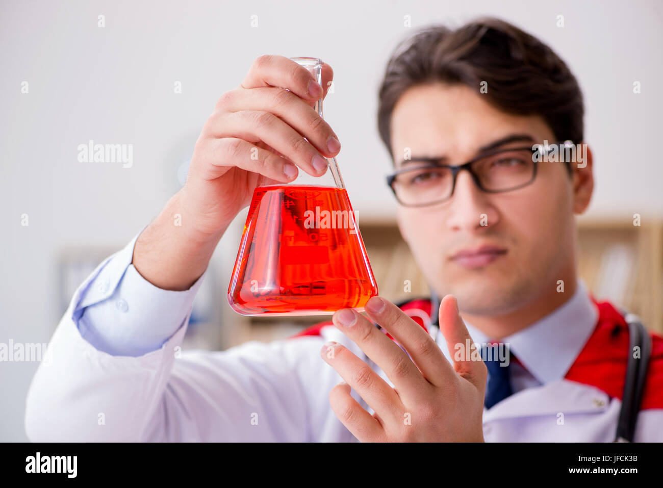 Superhero doctor working in the lab hospital Stock Photo - Alamy