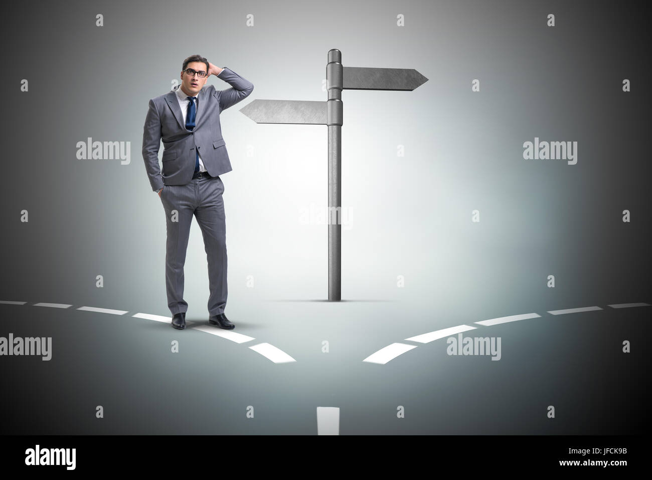 Businessman in difficult choice concept Stock Photo - Alamy