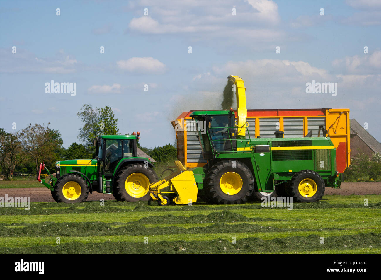 Farmers harvesting grass Stock Photo - Alamy
