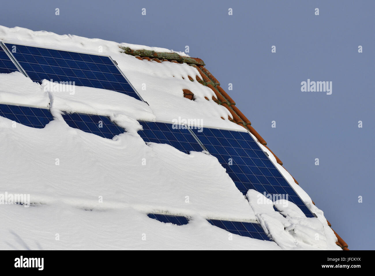 Solar panels with snow Stock Photo - Alamy