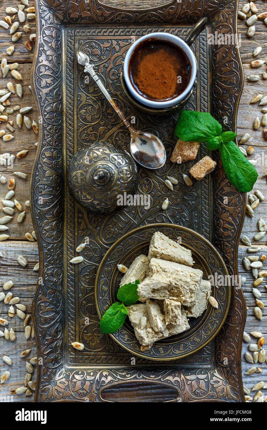 Black coffee and halva from sunflower Stock Photo - Alamy