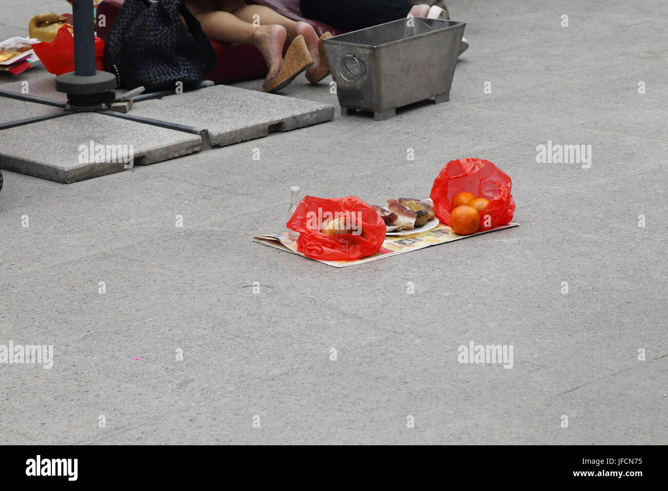 Sacrificial offerings on the ground Stock Photo - Alamy