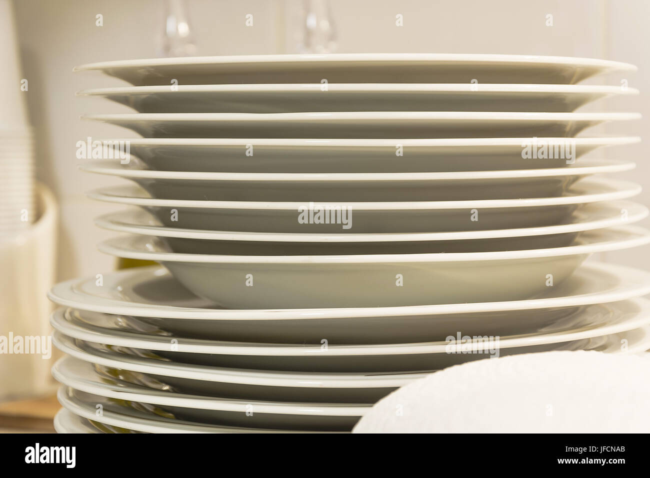 Clean plates isolated on white Stock Photo - Alamy