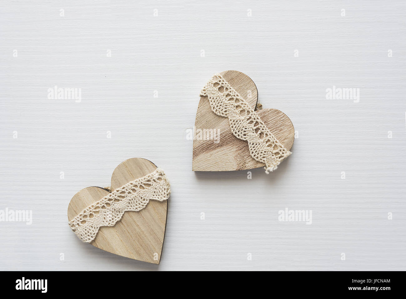 Two wooden hearts Stock Photo - Alamy
