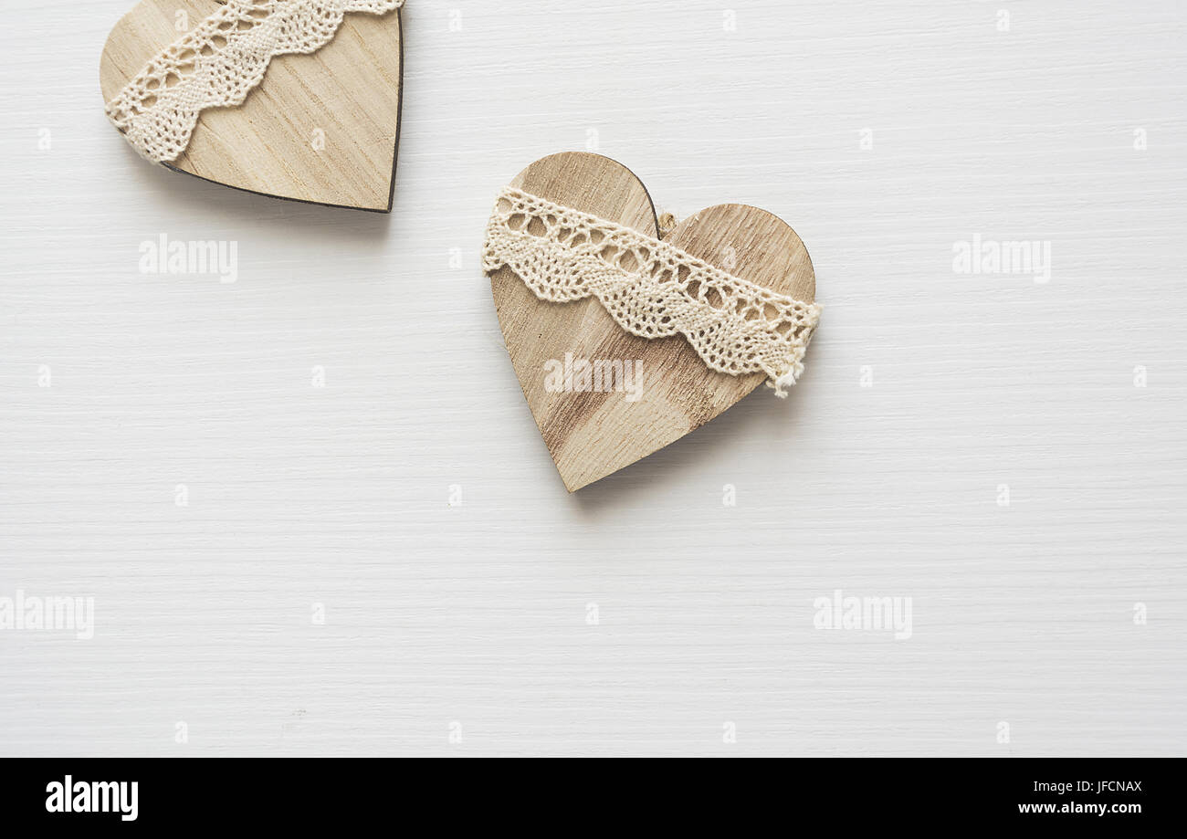 Two wooden hearts Stock Photo - Alamy