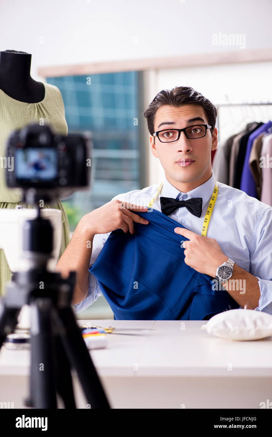 Young man working as fashion video blogger Stock Photo - Alamy