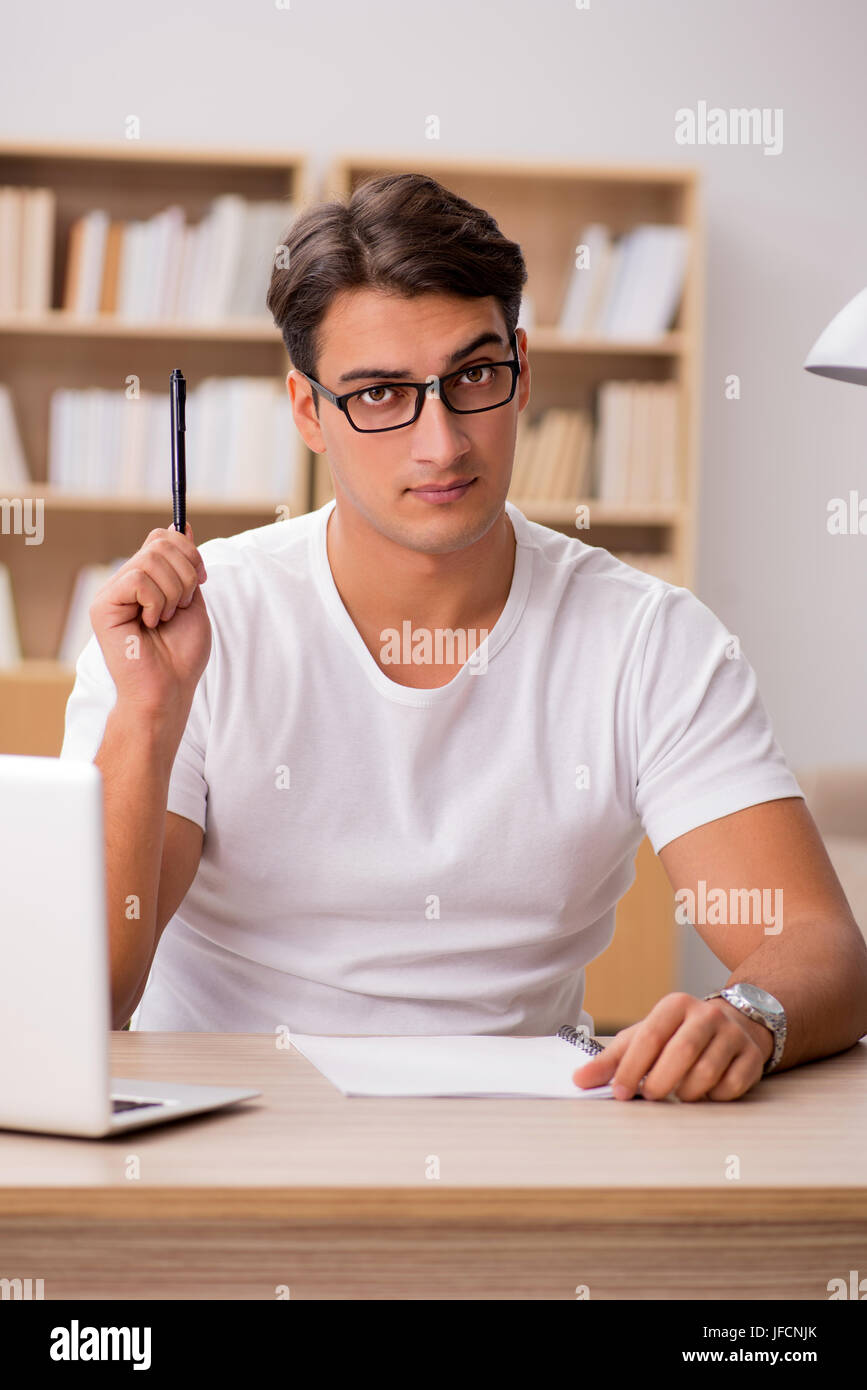 Young man working in the office Stock Photo - Alamy