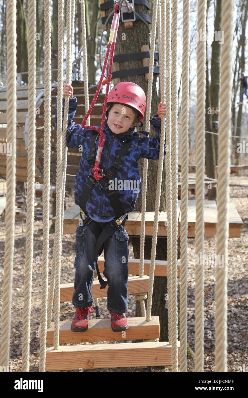 Climbing in the forest Stock Photo - Alamy
