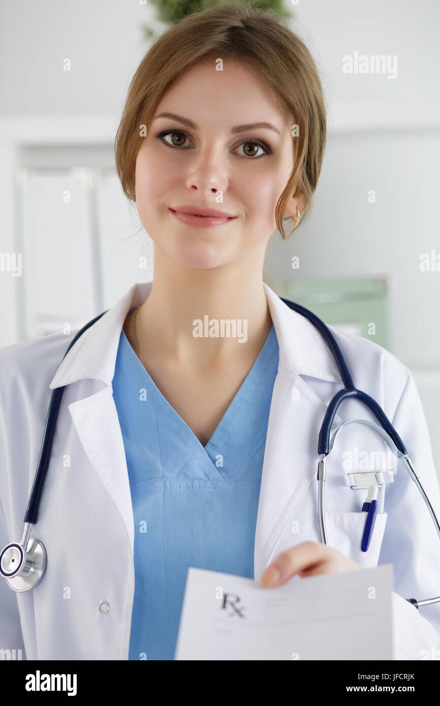 Medicine doctor giving prescription list to patient closeup. Healthcare ...