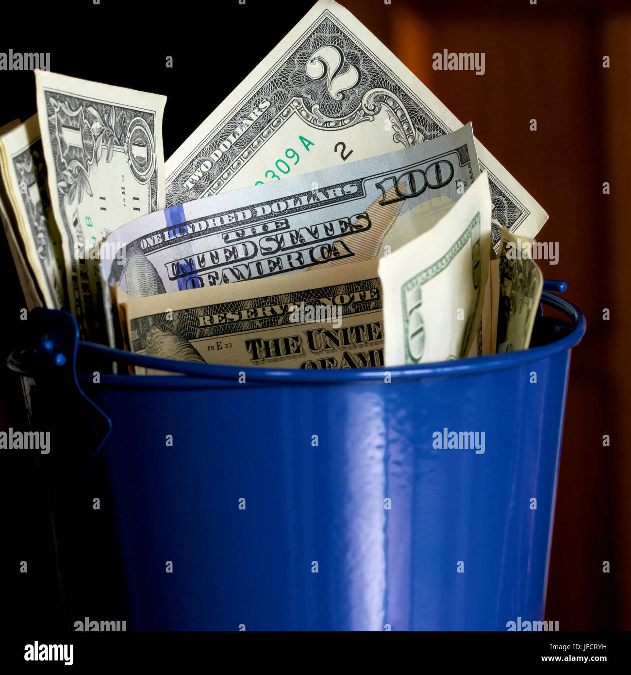 Bucket money hi-res stock photography and images - Alamy