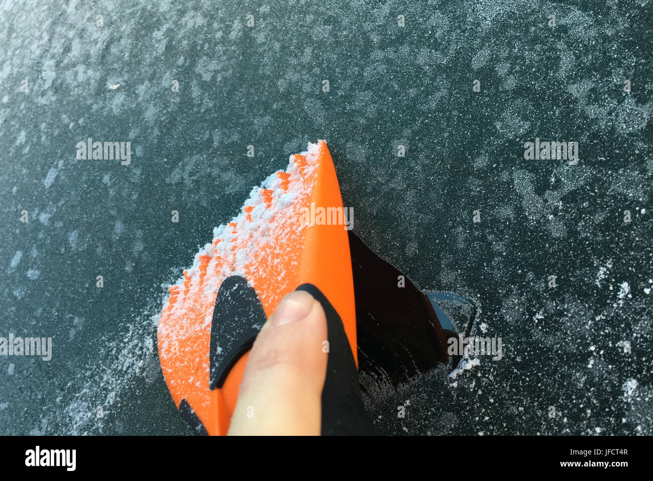 Scraping Car Windshield Stock Photo - Alamy