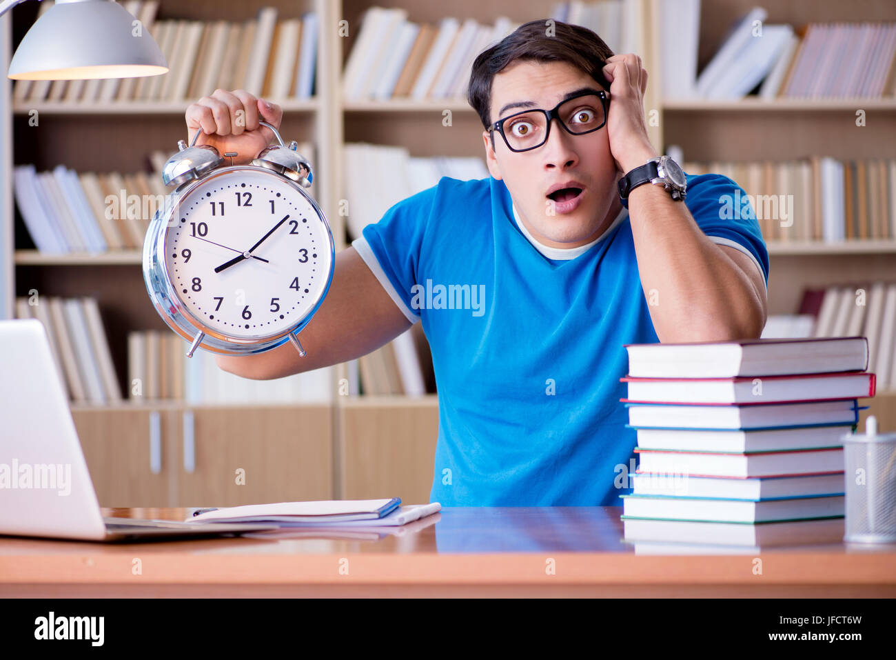 Young student preparing late for his exams Stock Photo - Alamy