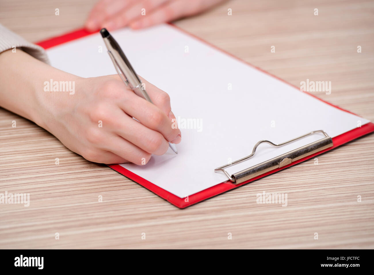 Hand writing memo in business concept Stock Photo - Alamy