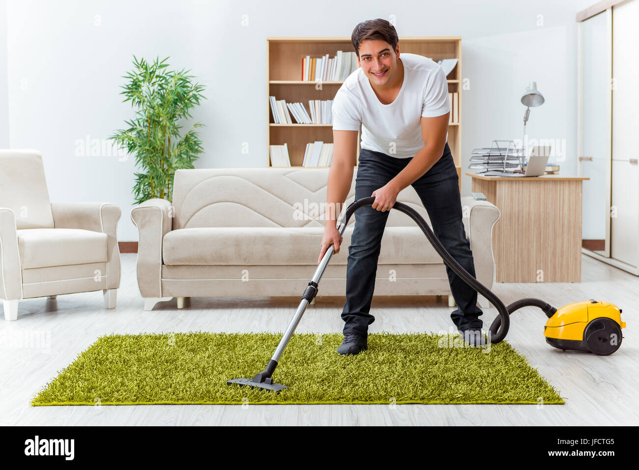 Beautiful wife cleaning floor husband hi-res stock photography and ...