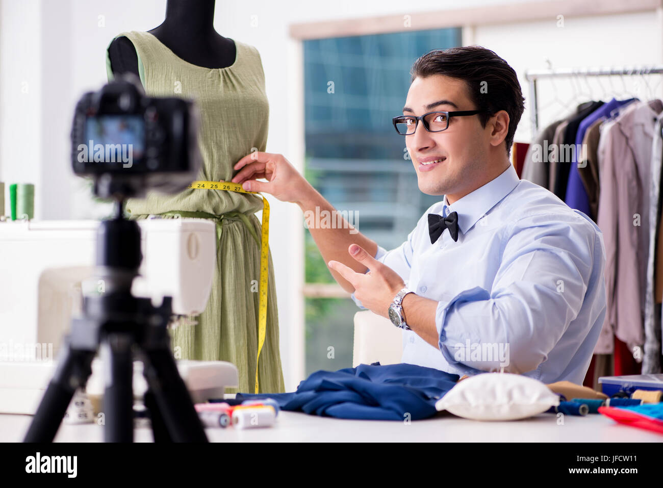 Young man working as fashion video blogger Stock Photo - Alamy