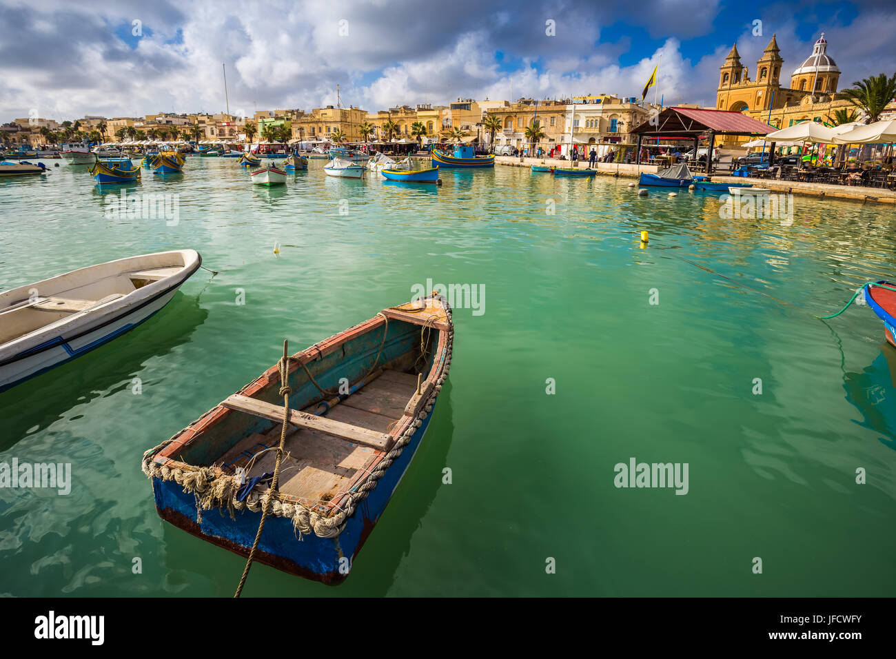 Marsaxlokk, Malta - Traditional colorful maltese Luzzu fisherboats at ...