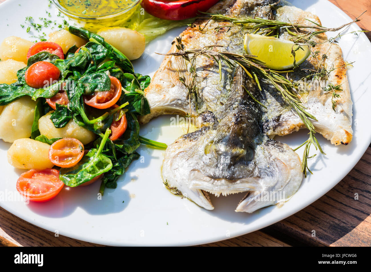 Fresh fish grilled sea bream Stock Photo - Alamy