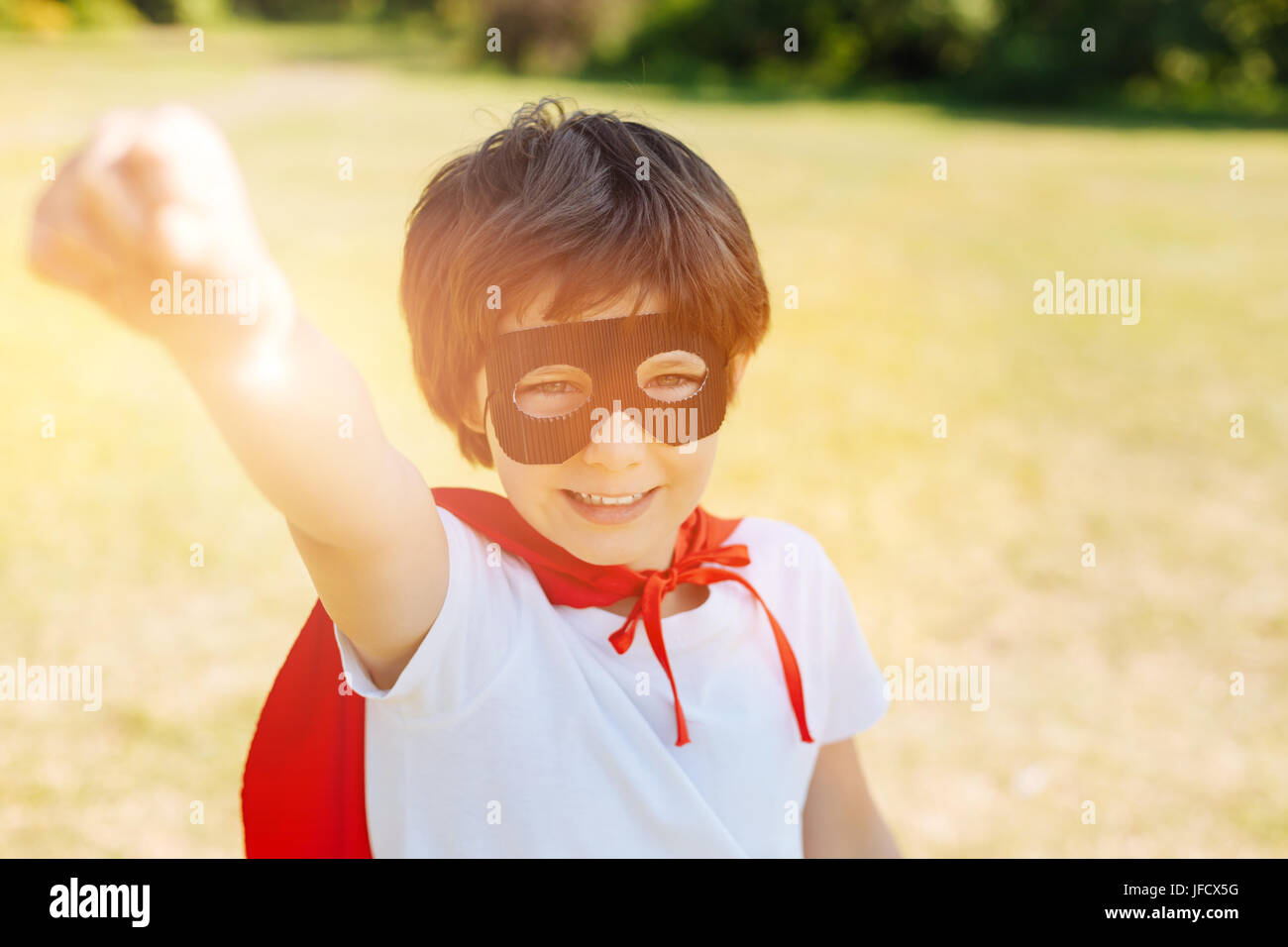 Chasing dreams. Energetic optimistic vibrant child wearing a costume ...