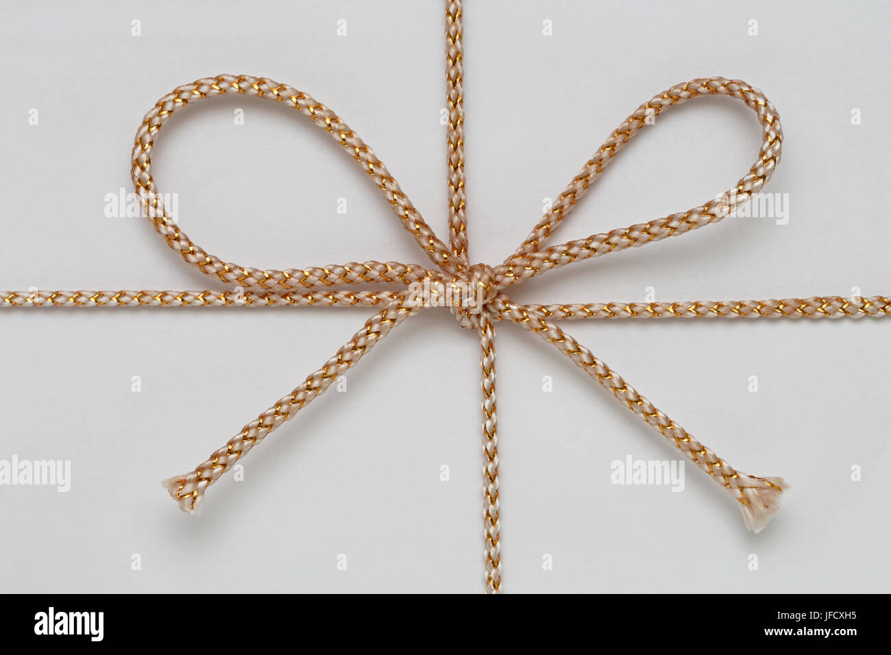 Golden String Bow Stock Photo - Alamy