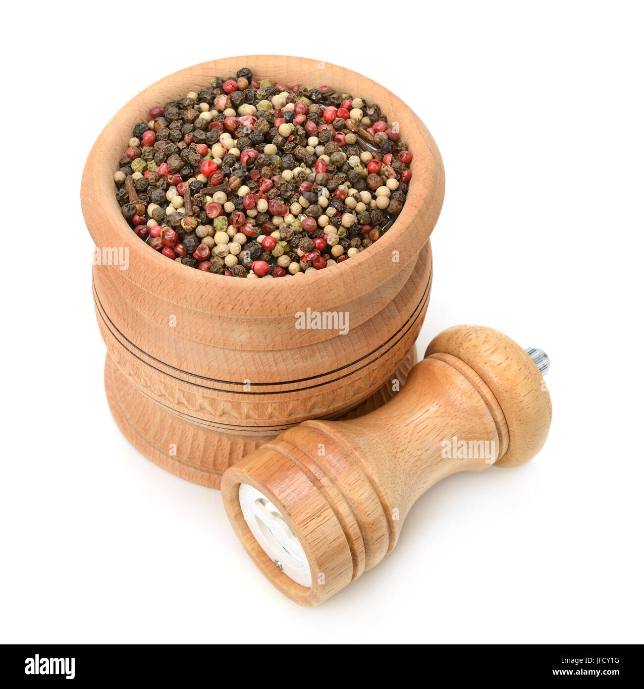 assortment of spices in wooden pot and mill isolated on white Stock ...