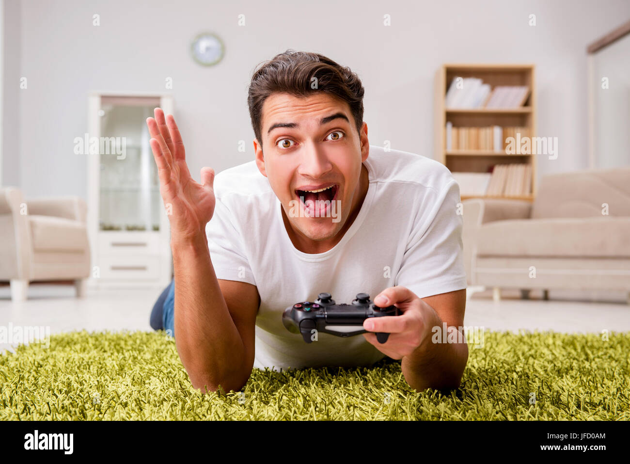 Man addicted to computer games Stock Photo - Alamy