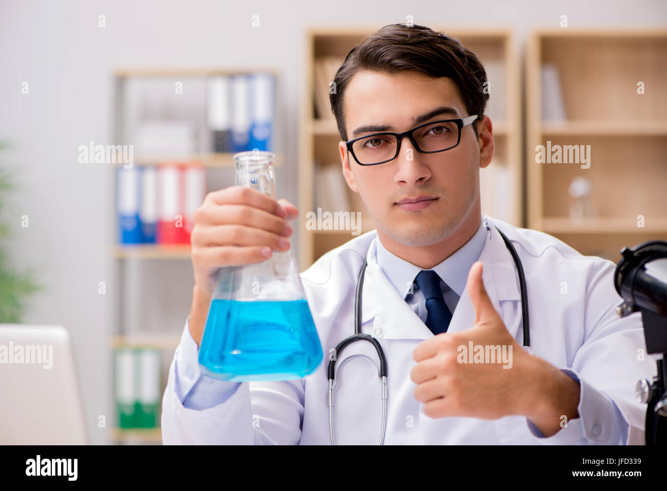 Man doctor working in the lab Stock Photo - Alamy