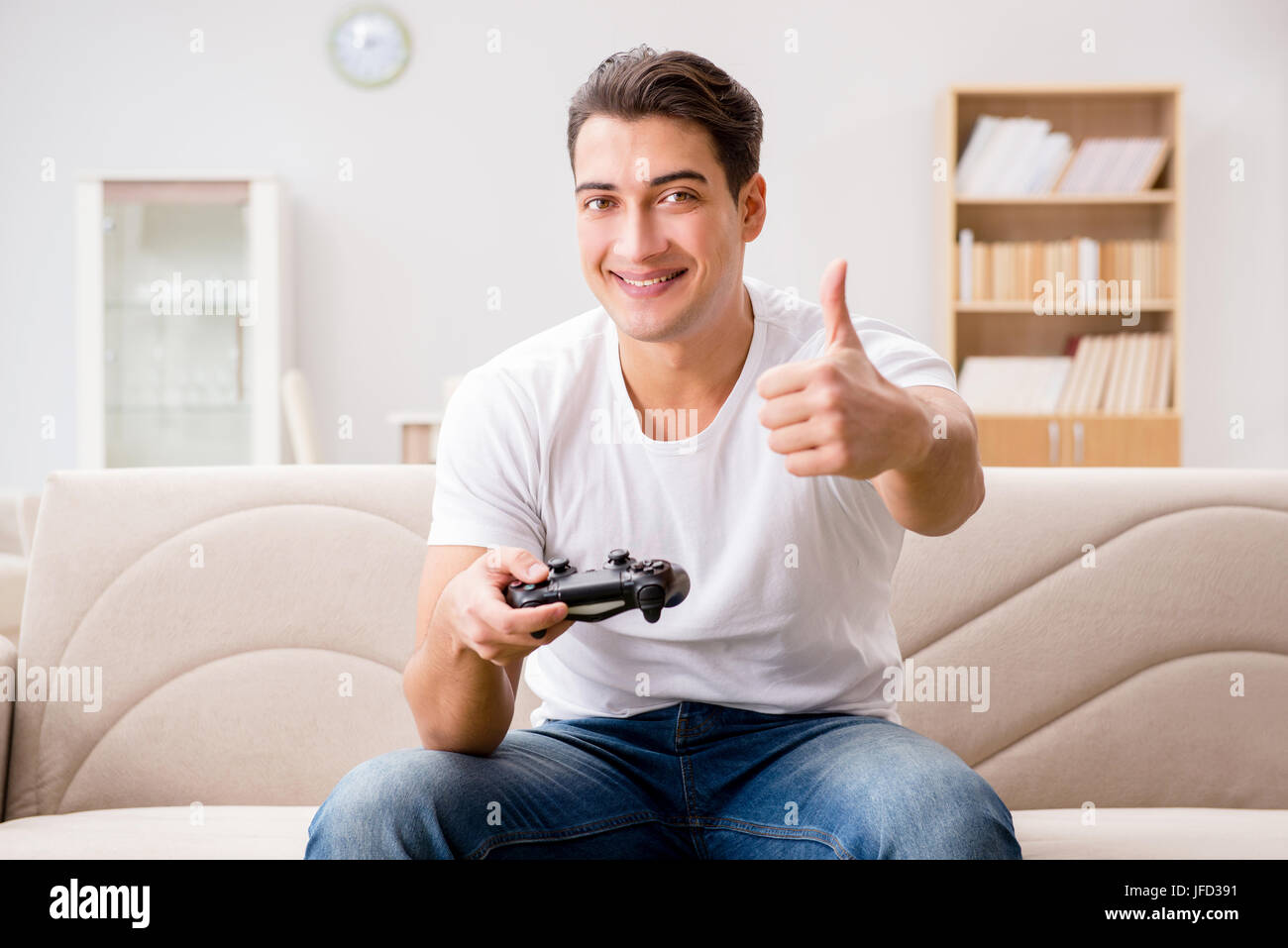 Man addicted to computer games Stock Photo - Alamy