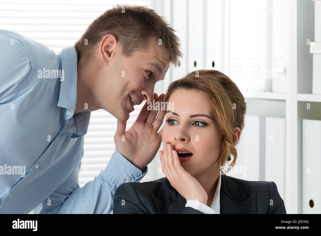 Woman colleague gossip hi-res stock photography and images - Alamy