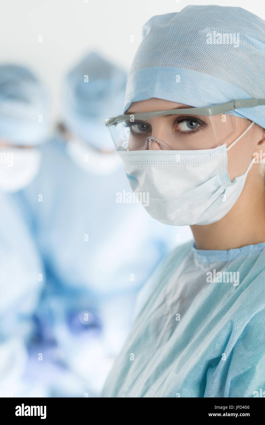 Portrait surgeon performing in operation hi-res stock photography and ...