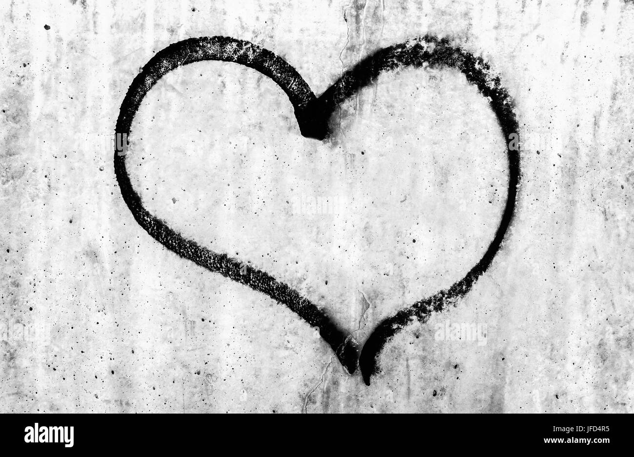 Heart symbol on wall Stock Photo - Alamy
