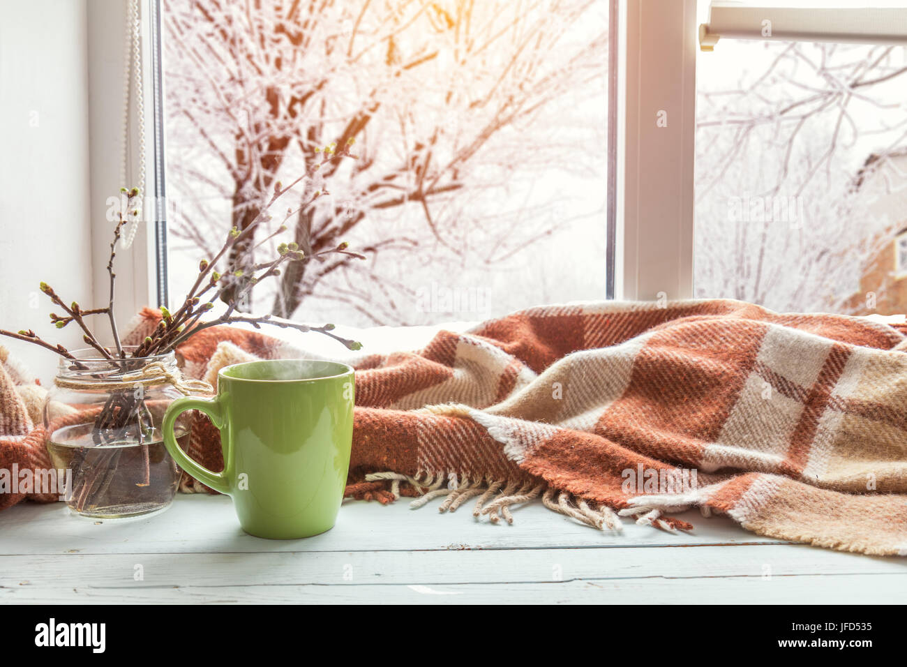 Cup of coffee on the window sill Stock Photo - Alamy