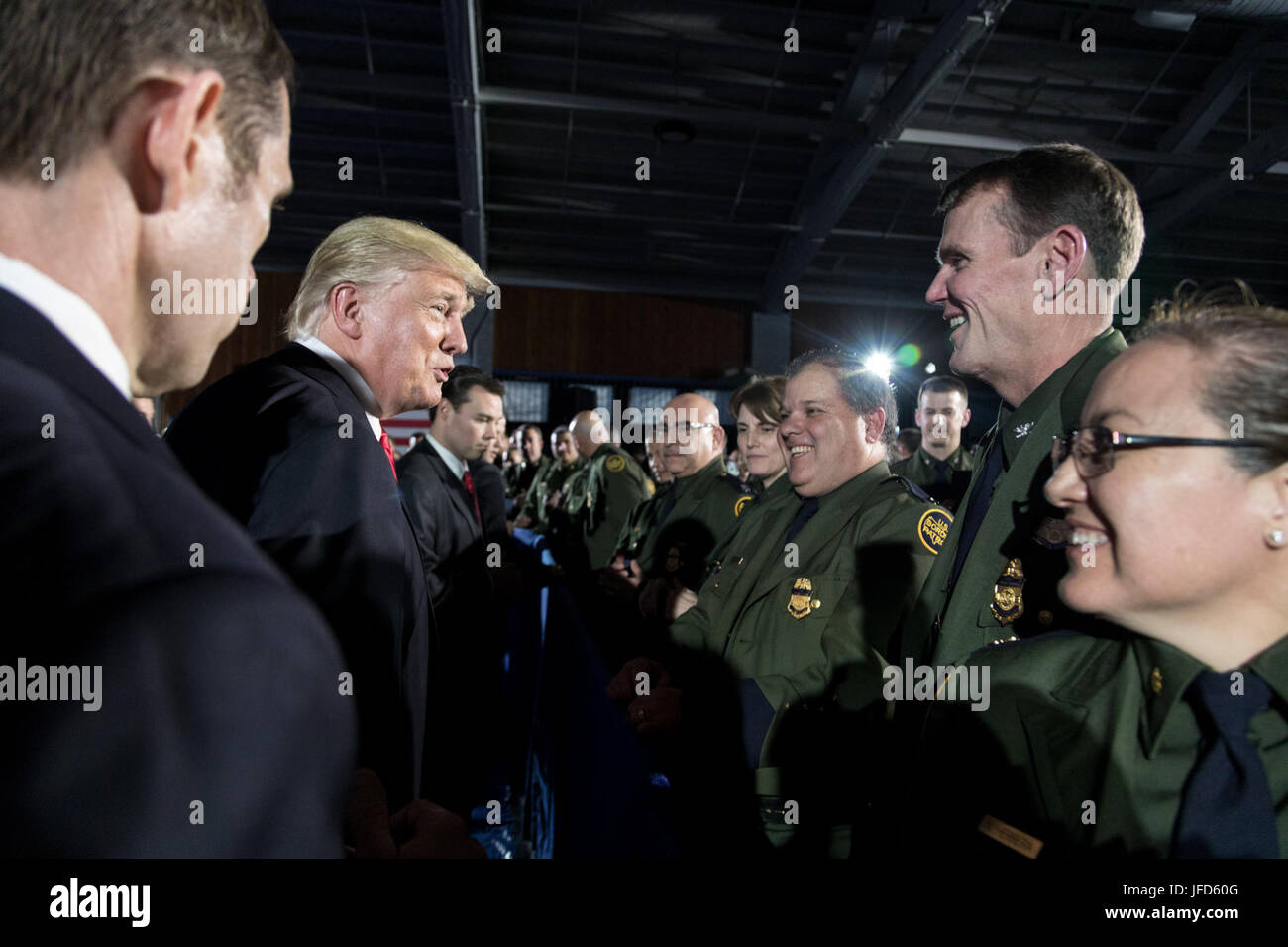 President Donald J. Trump greets audience members after delivering ...