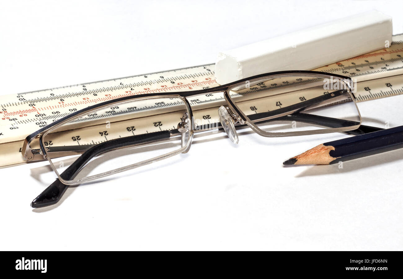 Glasses ruler pencil and chalk Stock Photo - Alamy