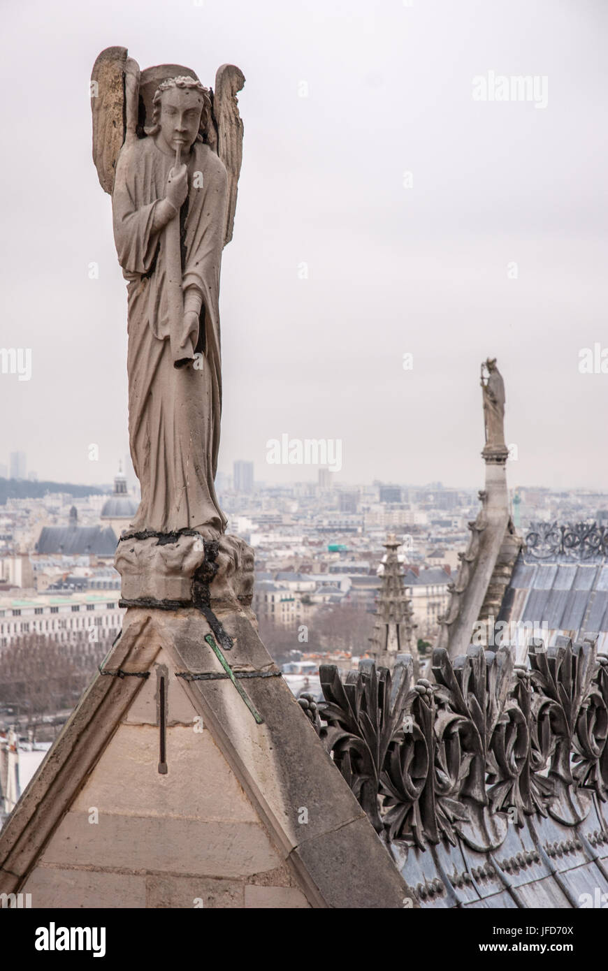 Angel is playing an horn Stock Photo - Alamy