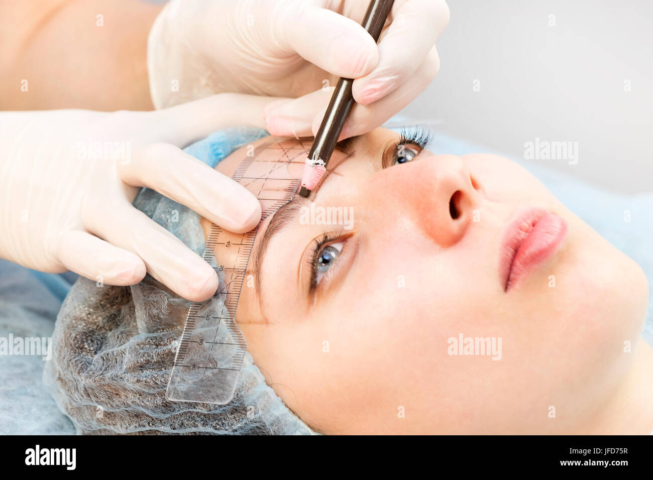 Microblading eyebrows workflow in a beauty salon Stock Photo - Alamy