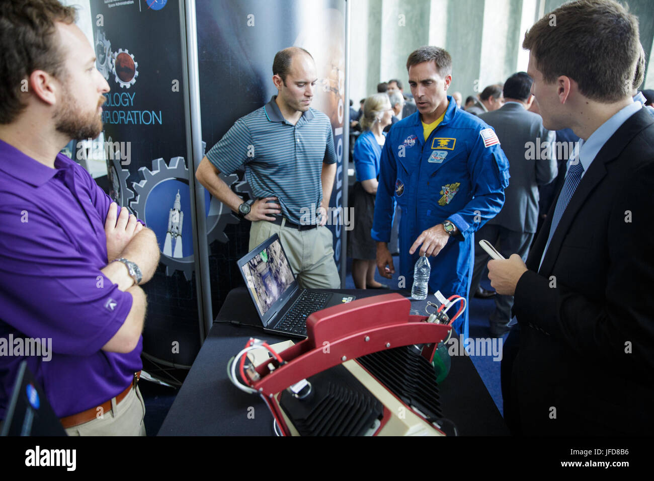 NASA astronaut Chris Cassidy inspects the Synchronized Position Hold ...