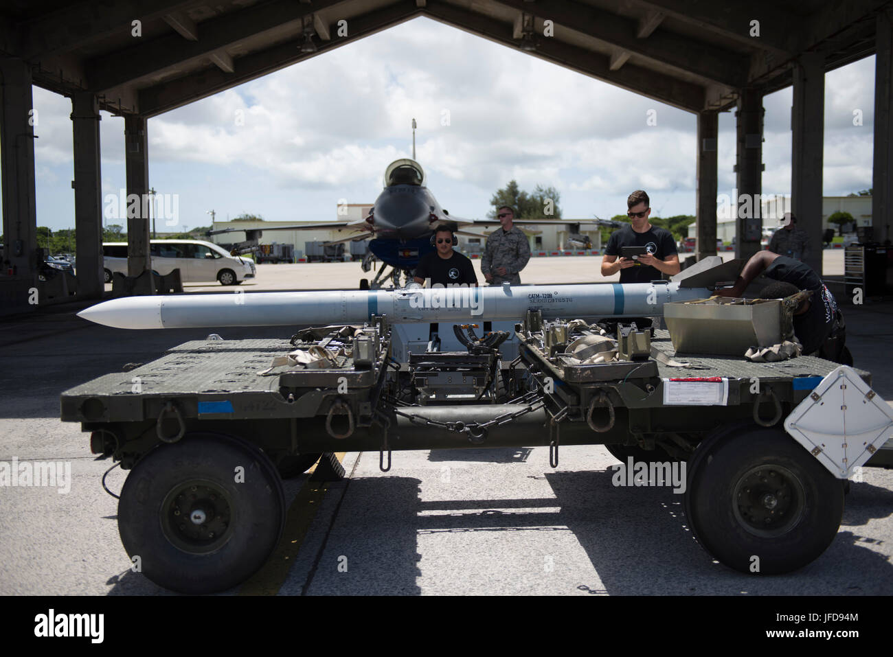 A Colorado Air National Guard 120th Fighter Squadron weapons load team ...