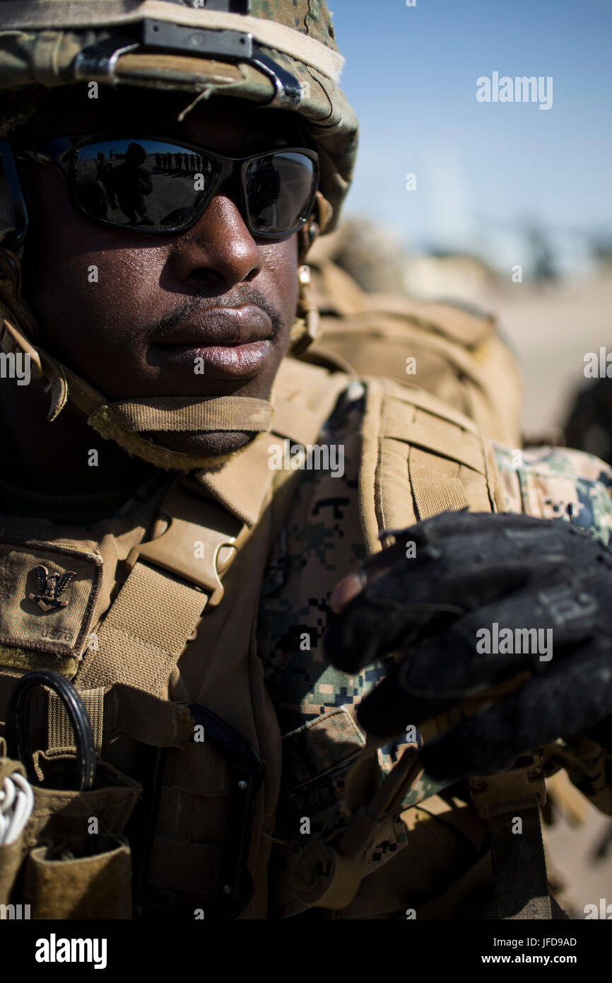 Petty Officer 3rd Class Christopher Similien, a hospital corpsman ...