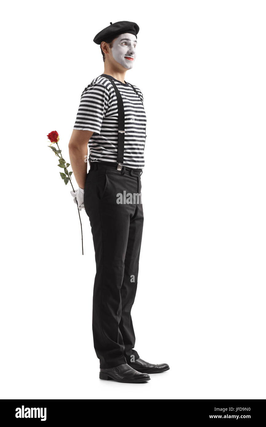 Full length profile shot of a mime with a rose waiting in line isolated ...