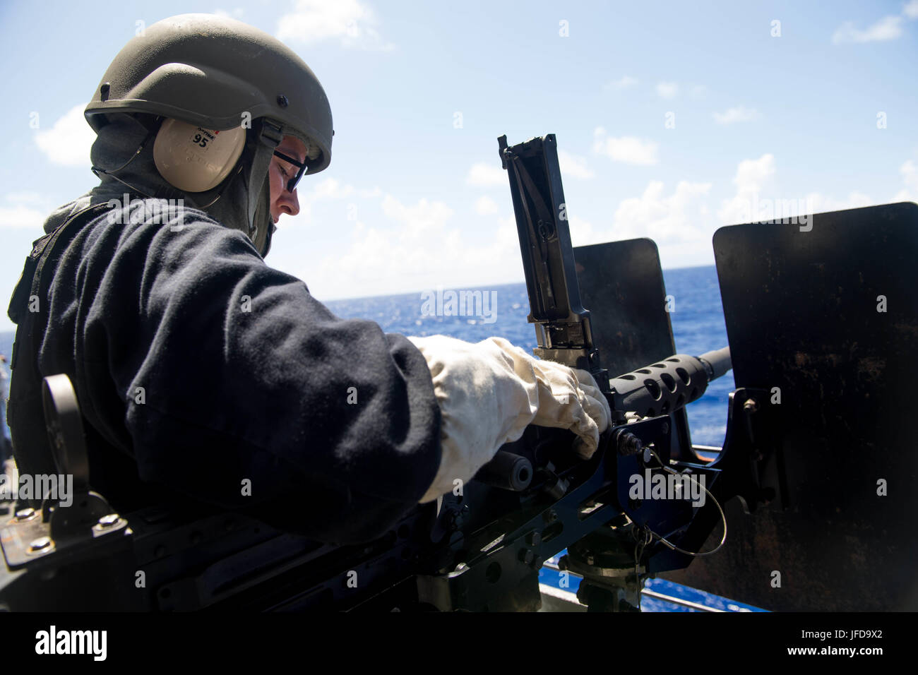 Navy loads 50 caliber machine gun hi-res stock photography and images ...
