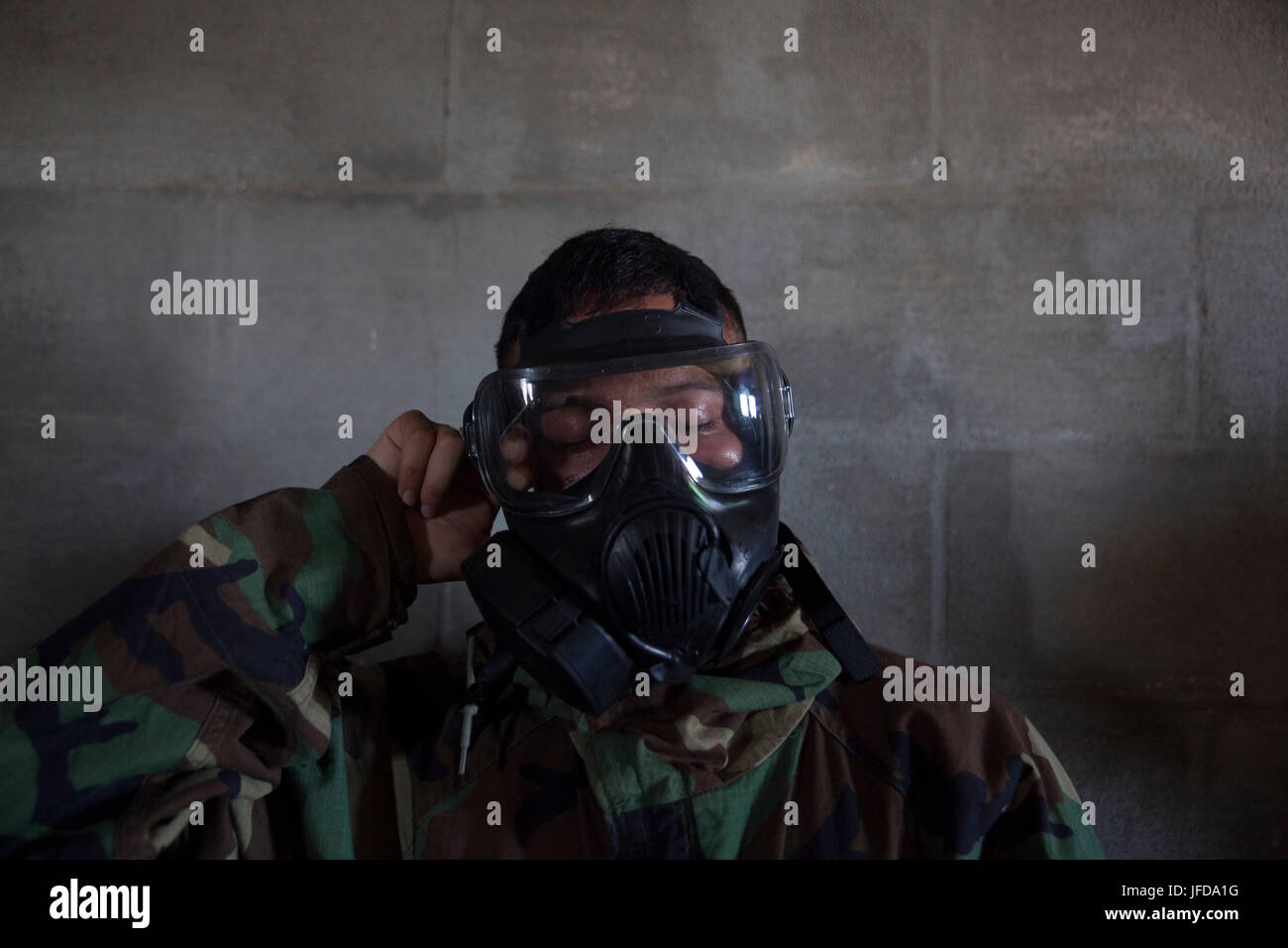A Marine assigned to Combat Logistics Battalion 3 clears his M50 joint ...