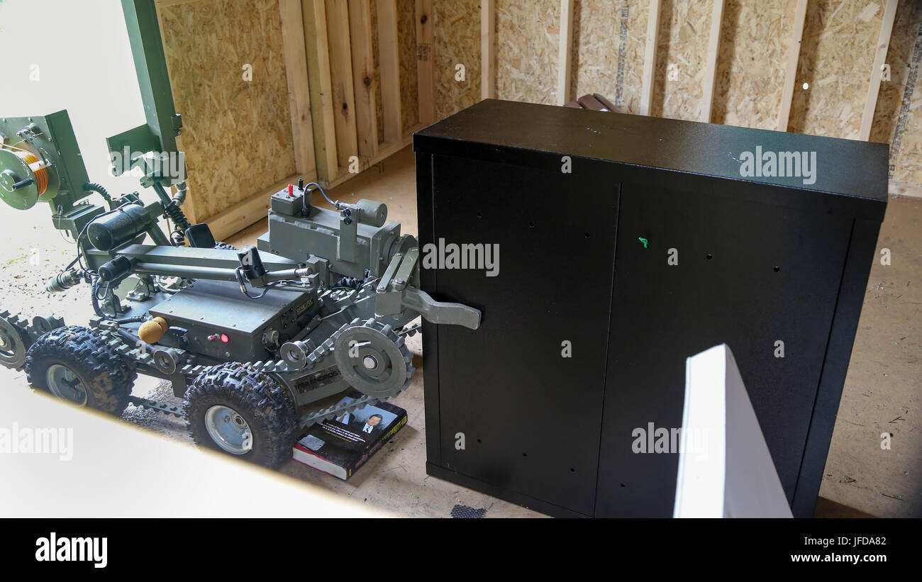 A Mini ANDROS II Robot, controlled by personnel assigned to Rapides ...