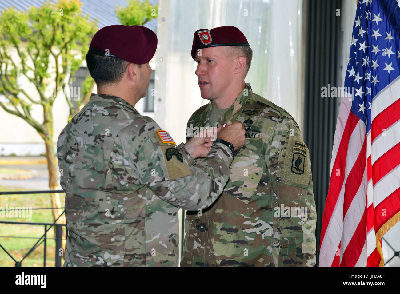 U. S. Army Paratrooper Col. Gregory K. Anderson (left), commander of ...