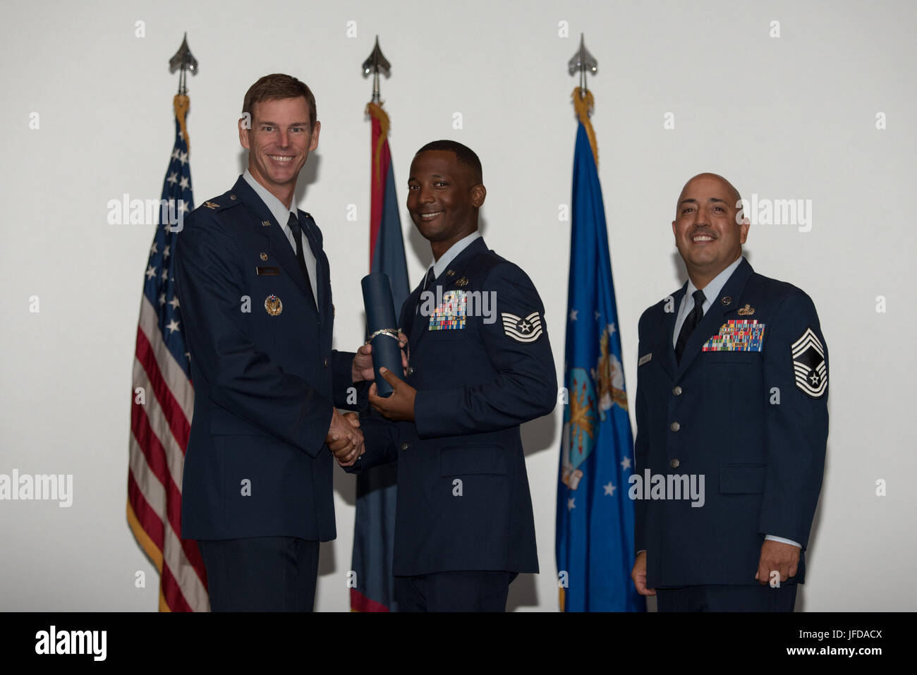 A member of the 644th Combat Communications Squadron is recognized for ...